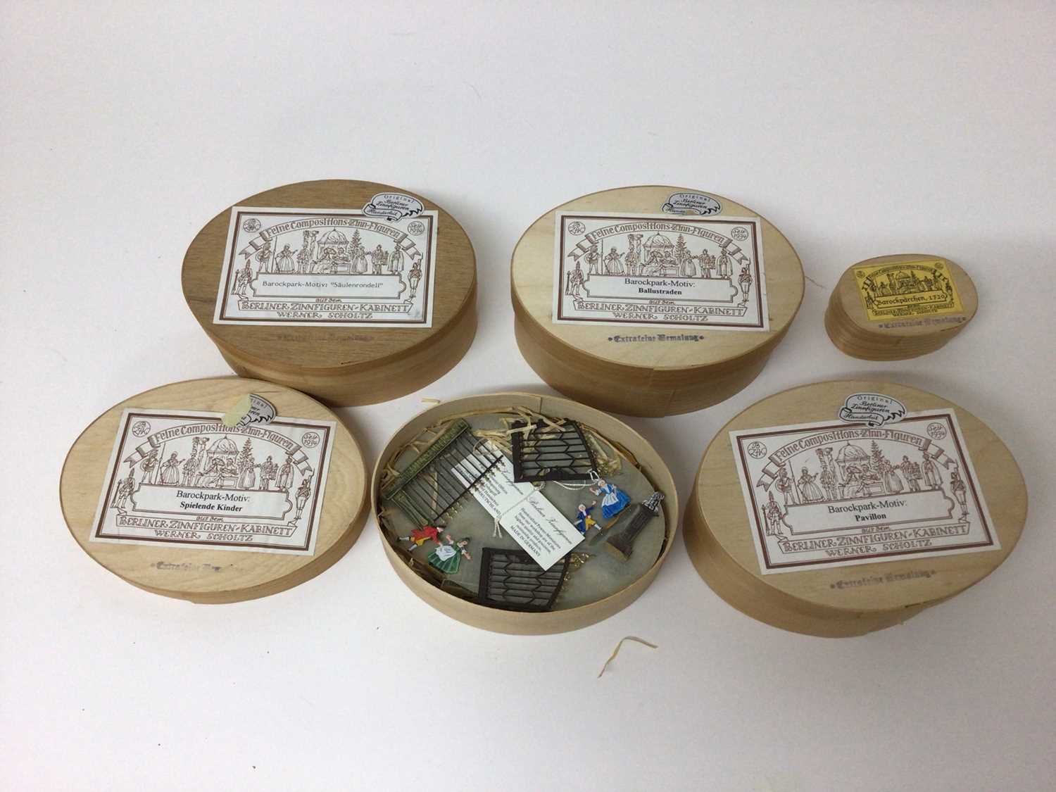 Lot 85 - Five boxed sets of German hand painted tin