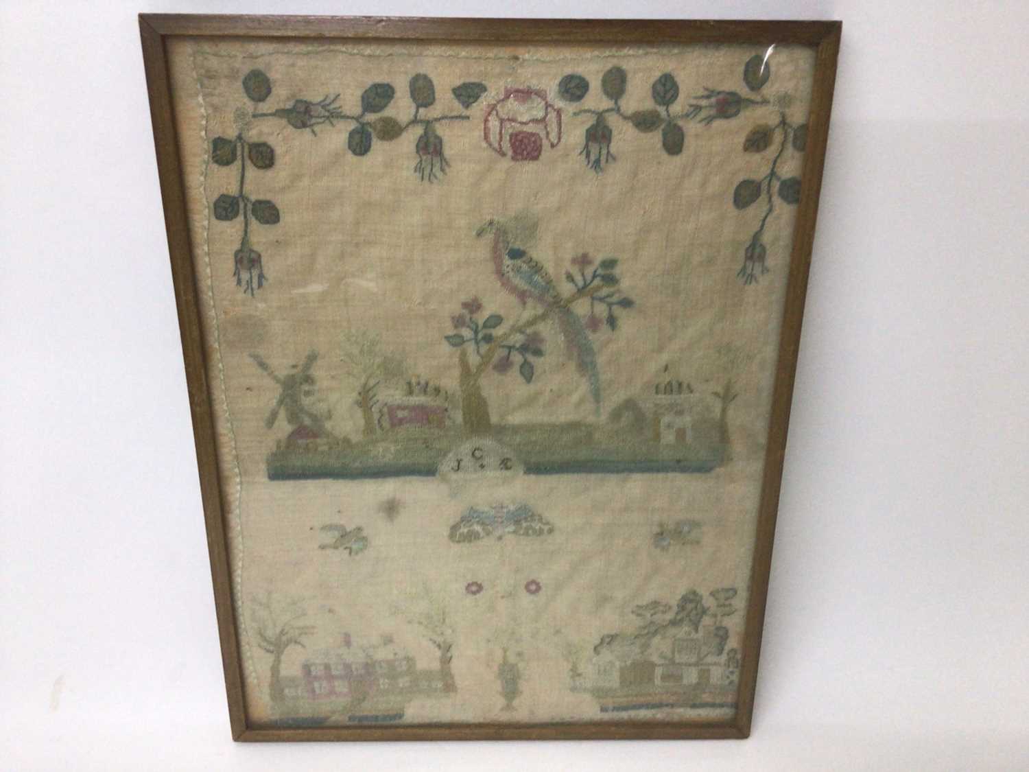 Lot 2147 - Early sampler of primitive form depicting