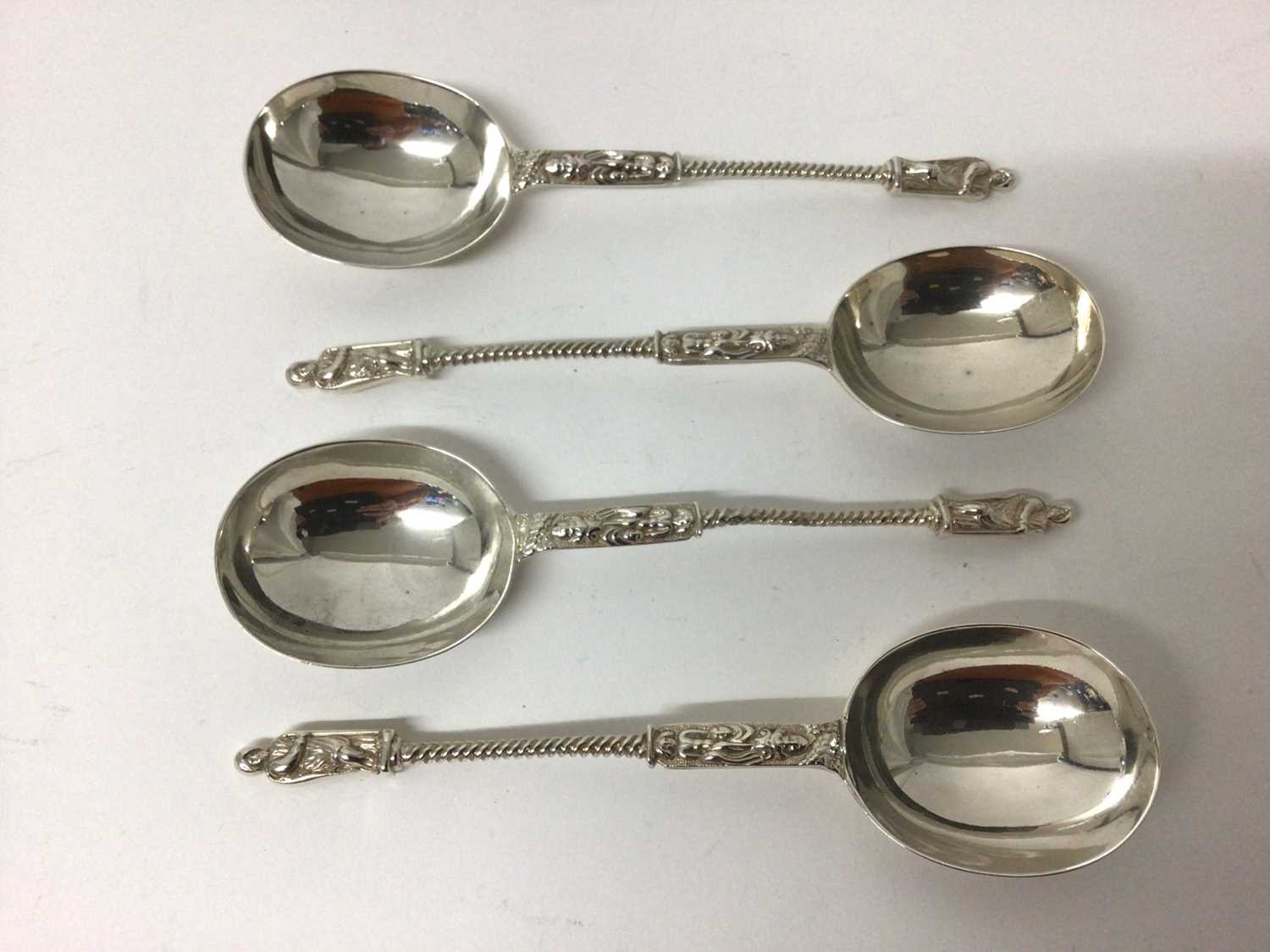 Lot 102 - Set of four Victorian silver Apostle spoons