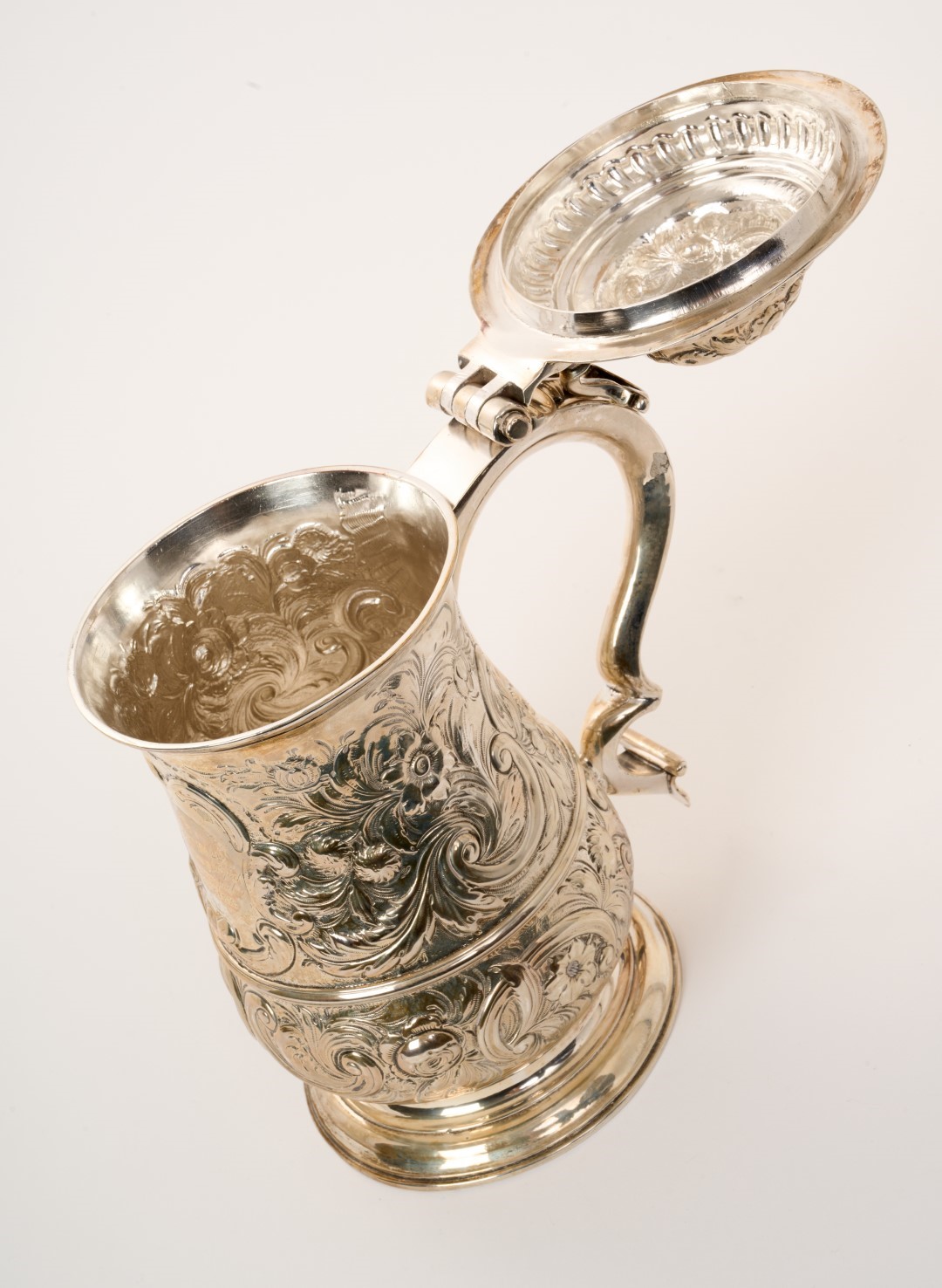 Lot 308 - George III silver lidded tankard with later