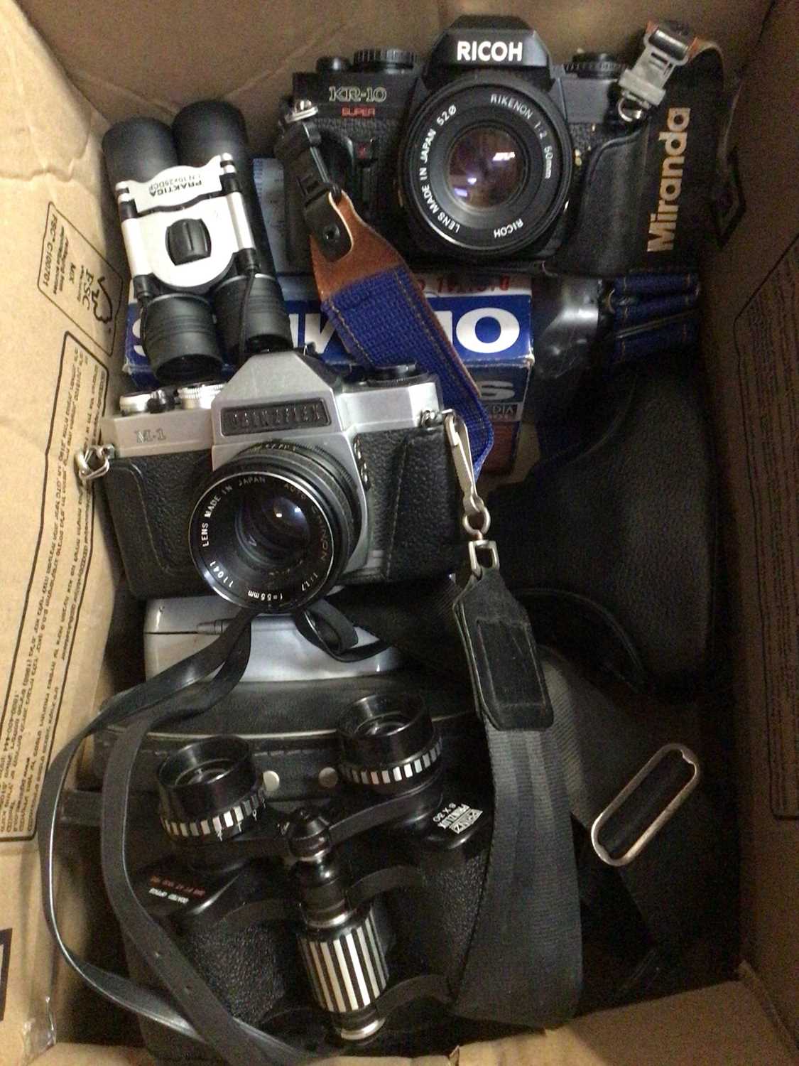 Lot 305 - Two boxes of vintage cameras, binoculars and