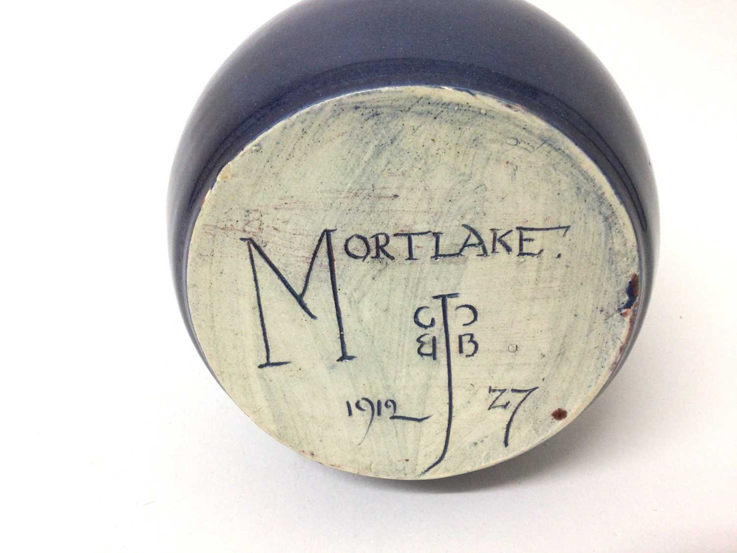 Lot 139 - Mortlake blue bottle vase, signed and dated