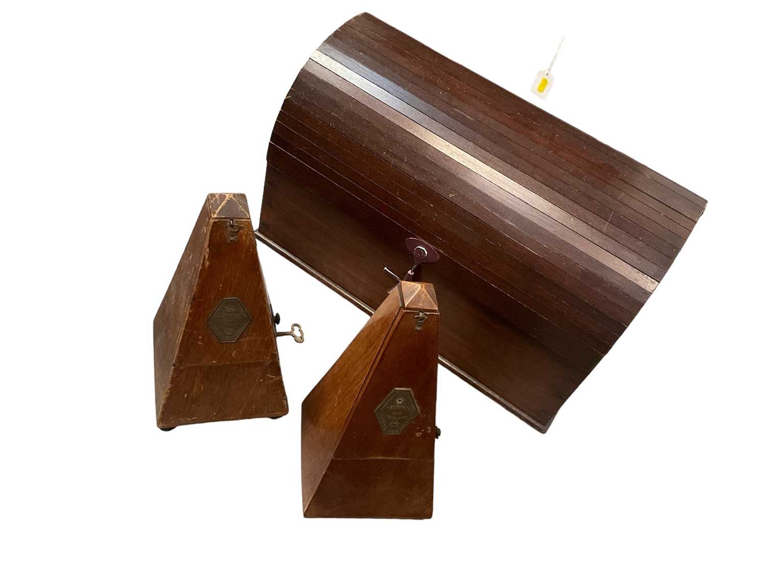 Lot 130 - Two metronomes and a tambour top stationary