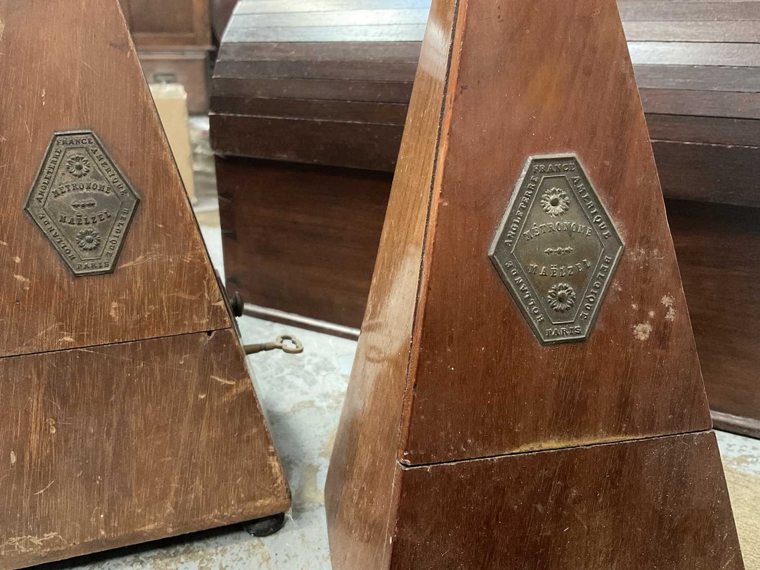 Lot 130 - Two metronomes and a tambour top stationary