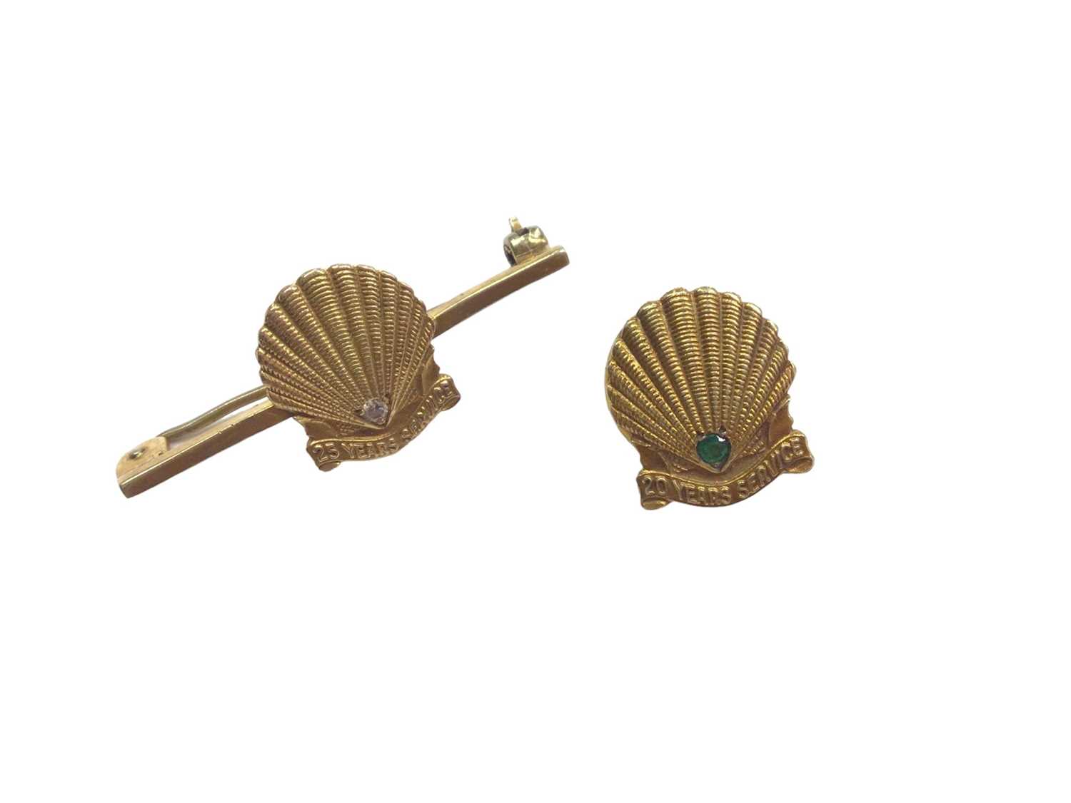Lot 1047 - Two 9ct gold Shell 25 years and 20 years of