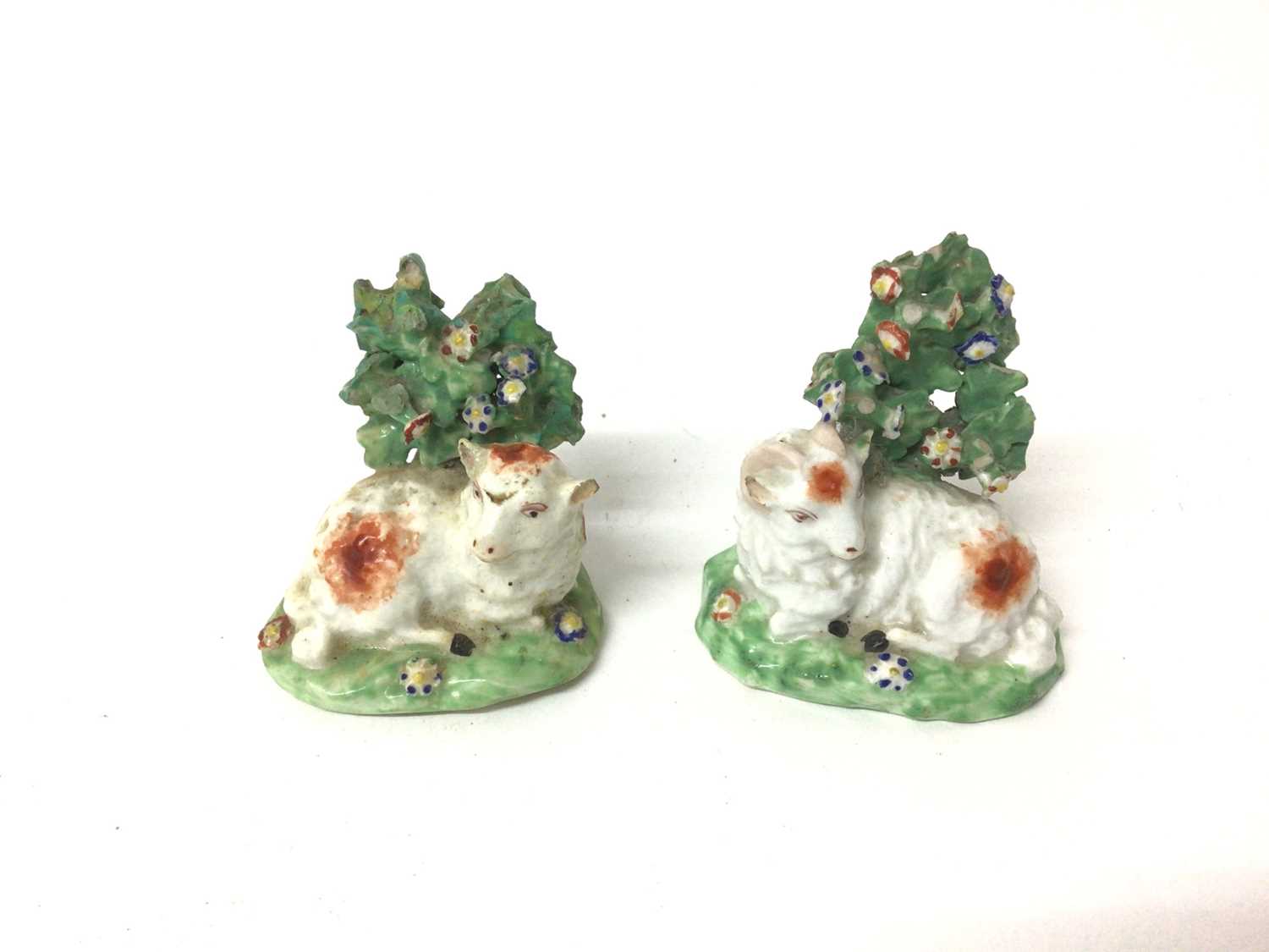 Lot 129 - Pair of Derby porcelain figures of recumbent
