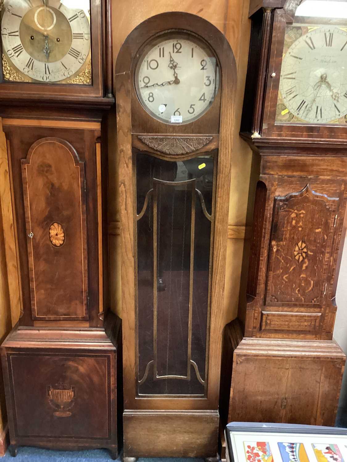 Lot 1202 - Early 20th century oak longcase clock with