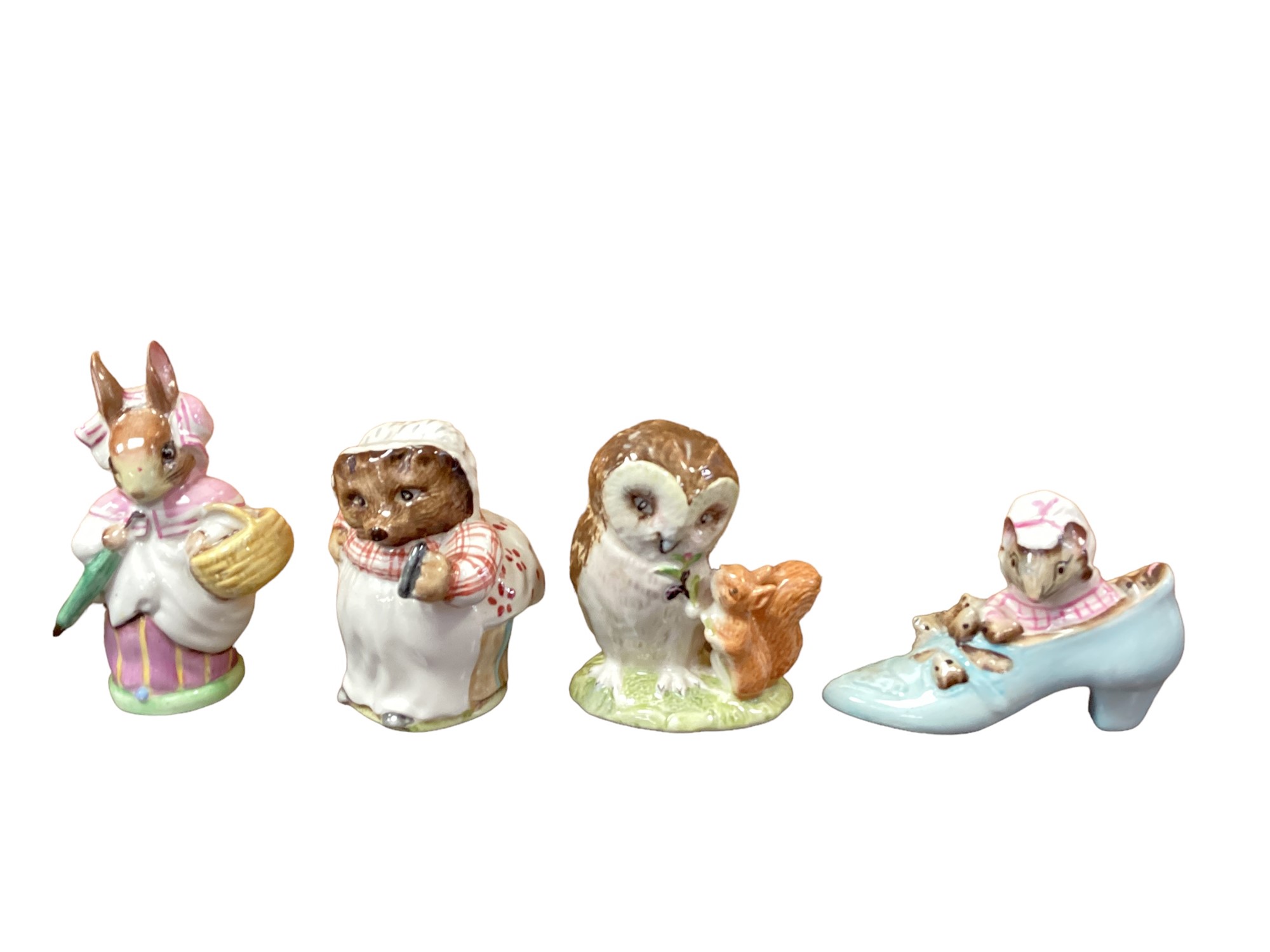 Eight Beswick Beatrix Potter figures including Tommy Brock and Squirrel ...