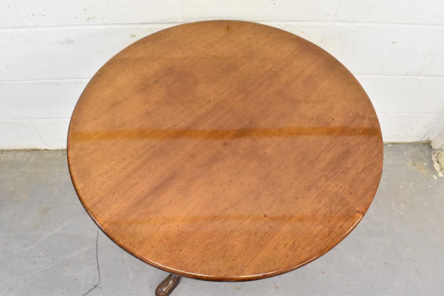 Lot 1411 - Unusual Georgian tilt top wine table with