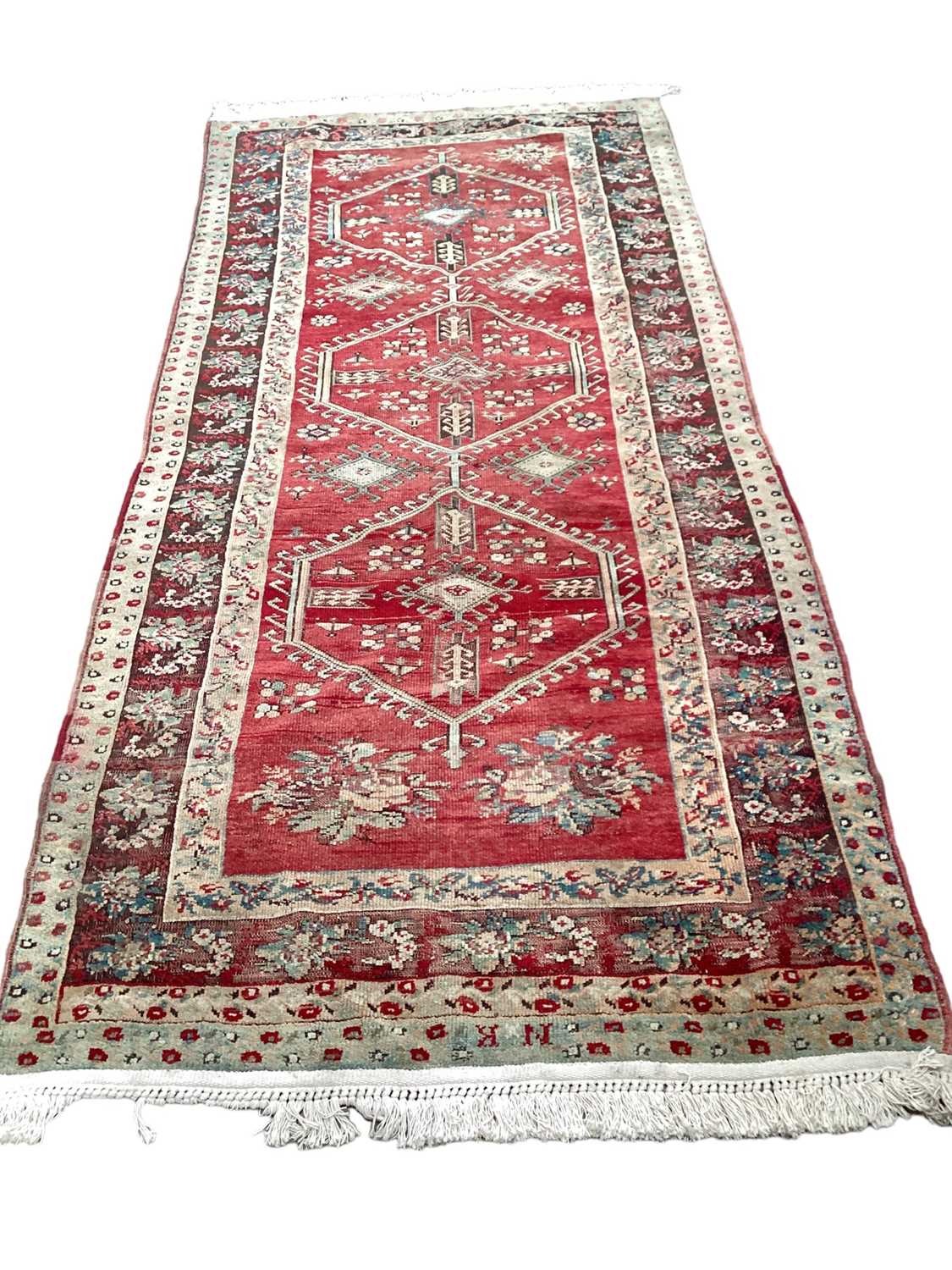 Lot 1370 - Eastern rug with three central medallions
