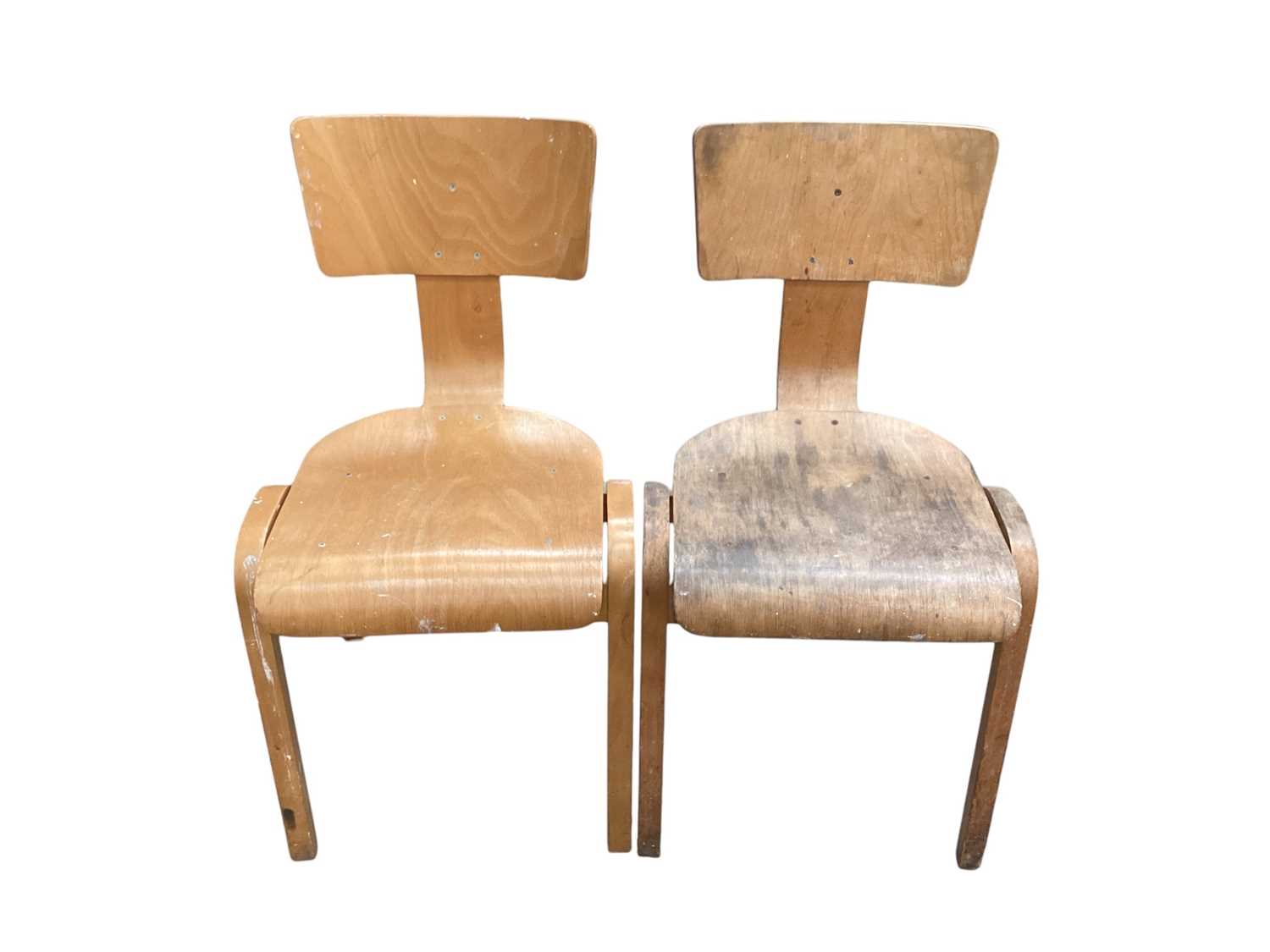 Lot 1397 - Three old plywood school chairs together