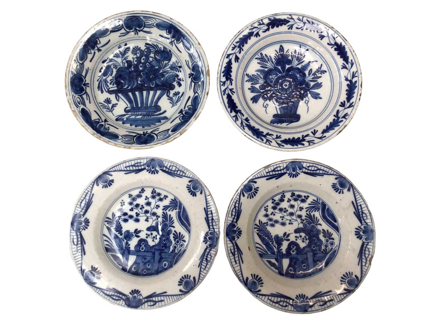 Lot 83 - Four 18th century blue and white Delft plates