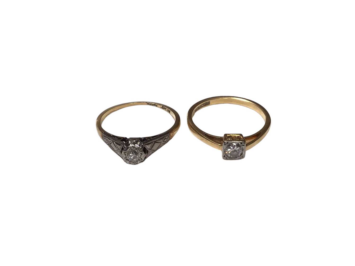 Lot 74 - Two 18ct gold diamond single stone rings in