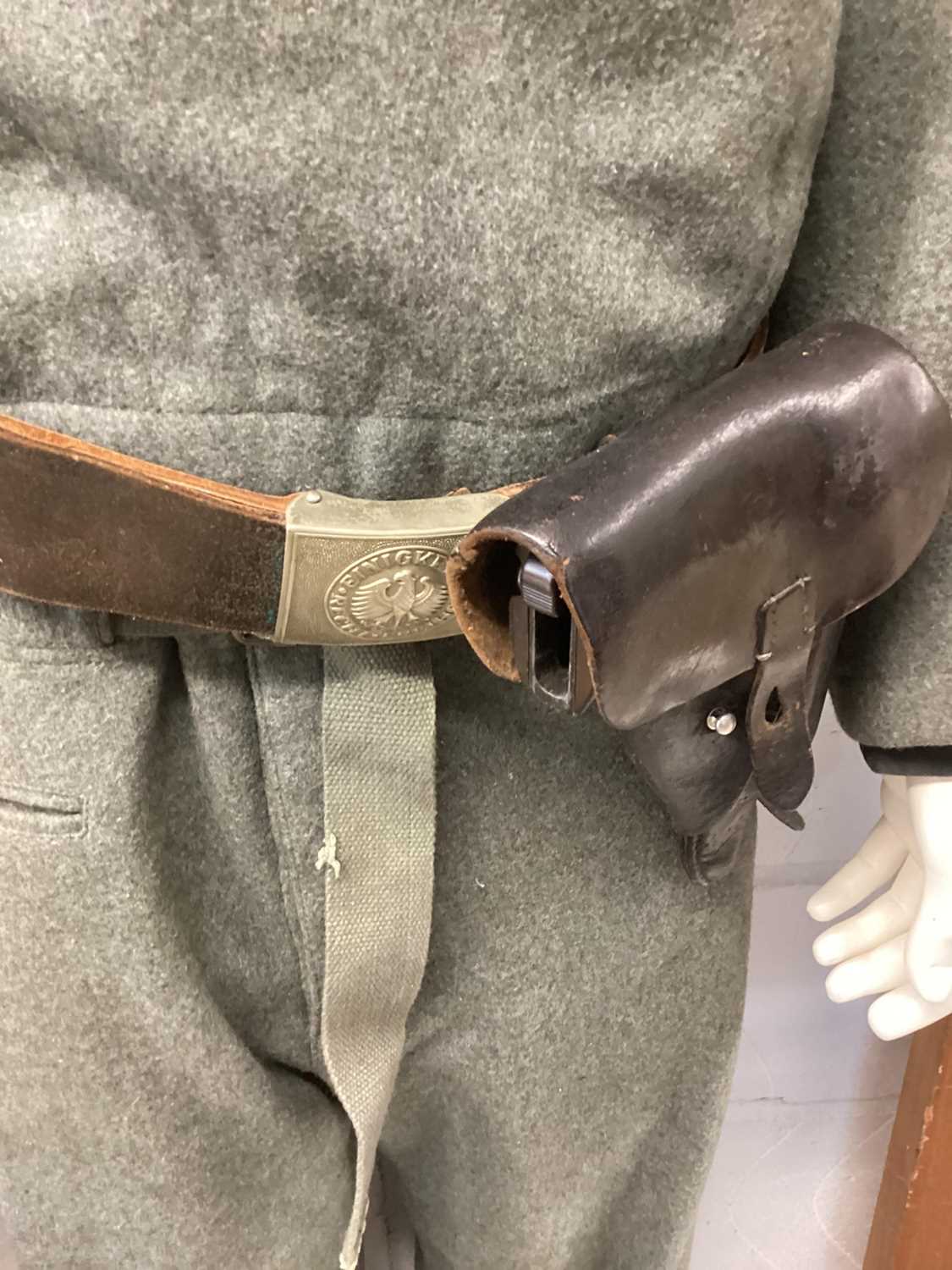 Lot 818 - Freestanding mannequin dressed in a replica