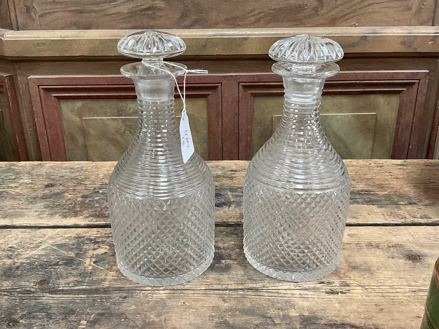 Lot 22 - Pair of Regency star-cut glass decanters and