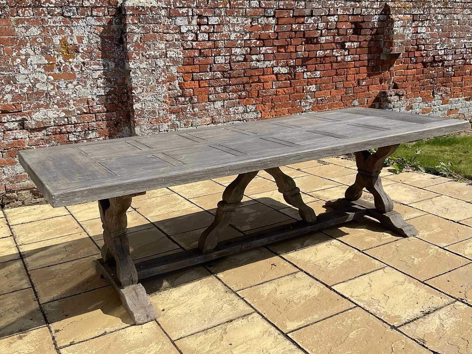 Lot 1371 - Large Oka hardwood garden trestle table