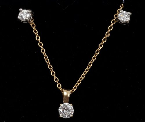 Lot 731 - Diamond single stone pendant and pair of