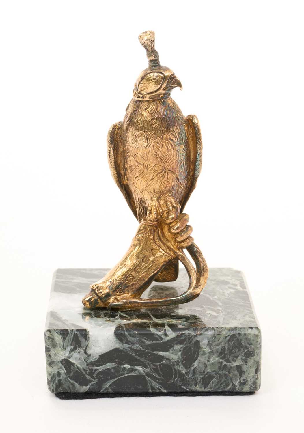 Lot 519 - Silver gilt falcon, by Garrards 1972, on