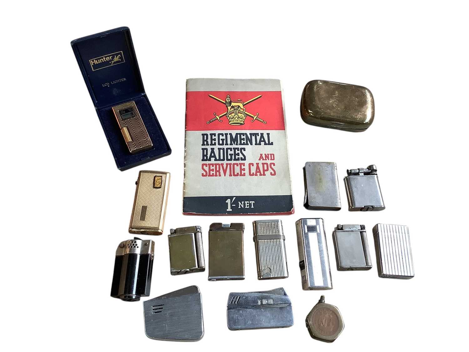 Lot 2466 - Box of lighters and cap badges