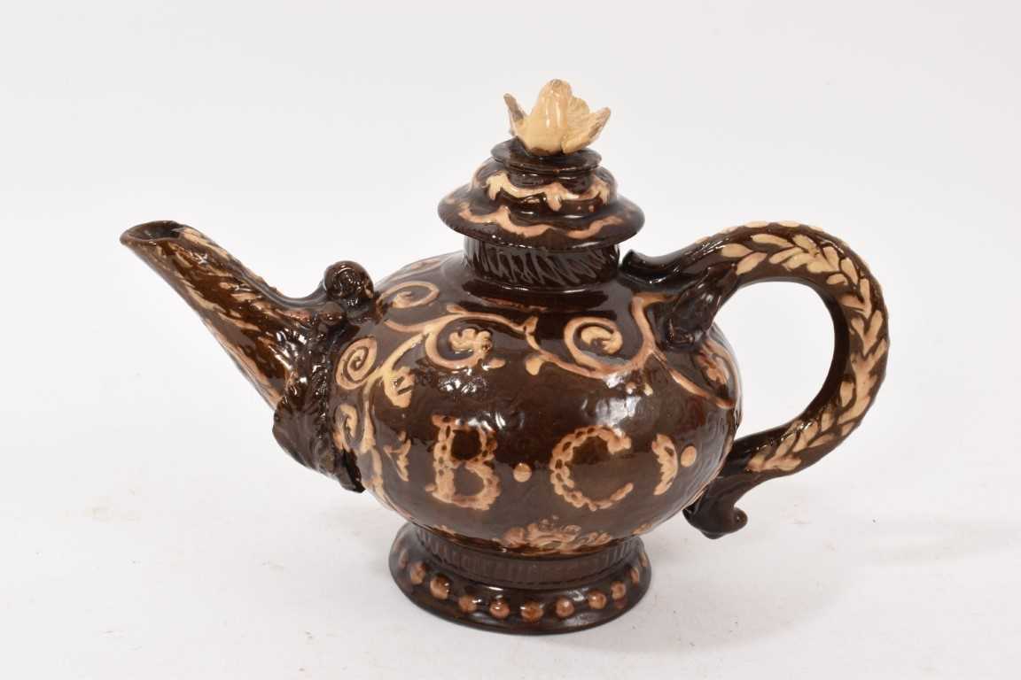 Lot 332 - Unusual small slipware teapot, dated 1851