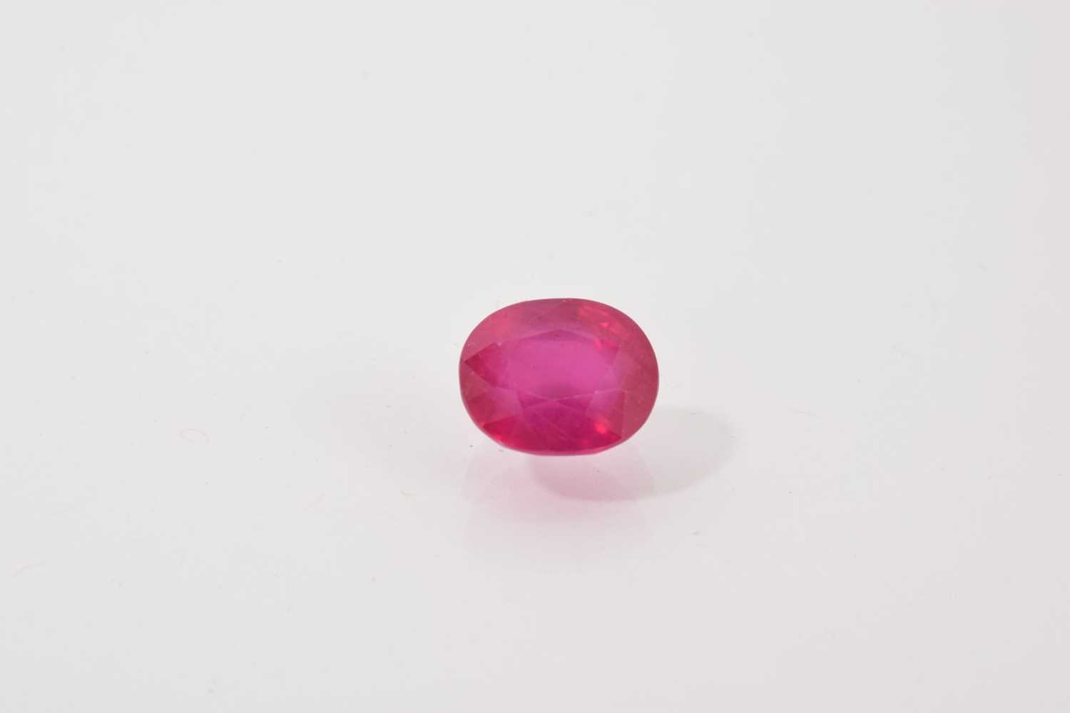 Lot 124 - Unmounted oval mixed cut ruby, weighing