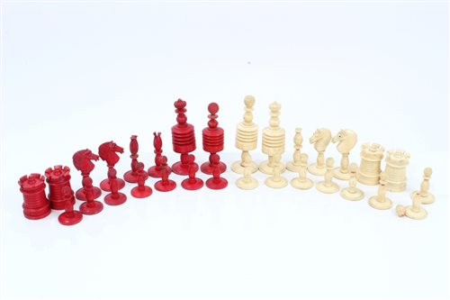 Lot 948 - 19th century carved and red stained bone