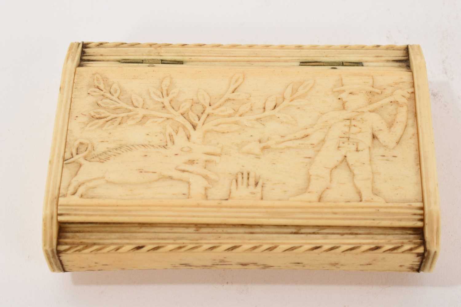 Lot 952 - Antique bone snuff box of a hunter