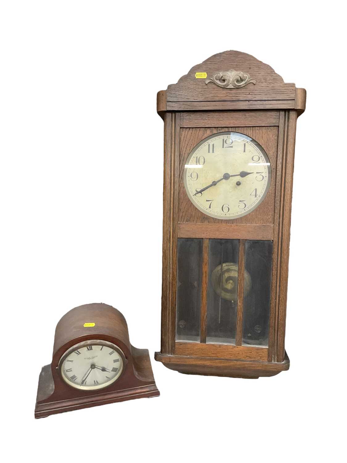 Lot 631 - 1920s wall clock in oak case and a mantel