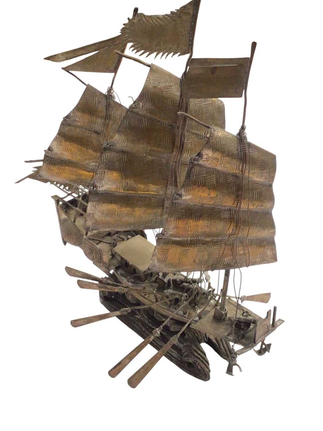Lot 1053 - Chinese white metal model of a junk boat on