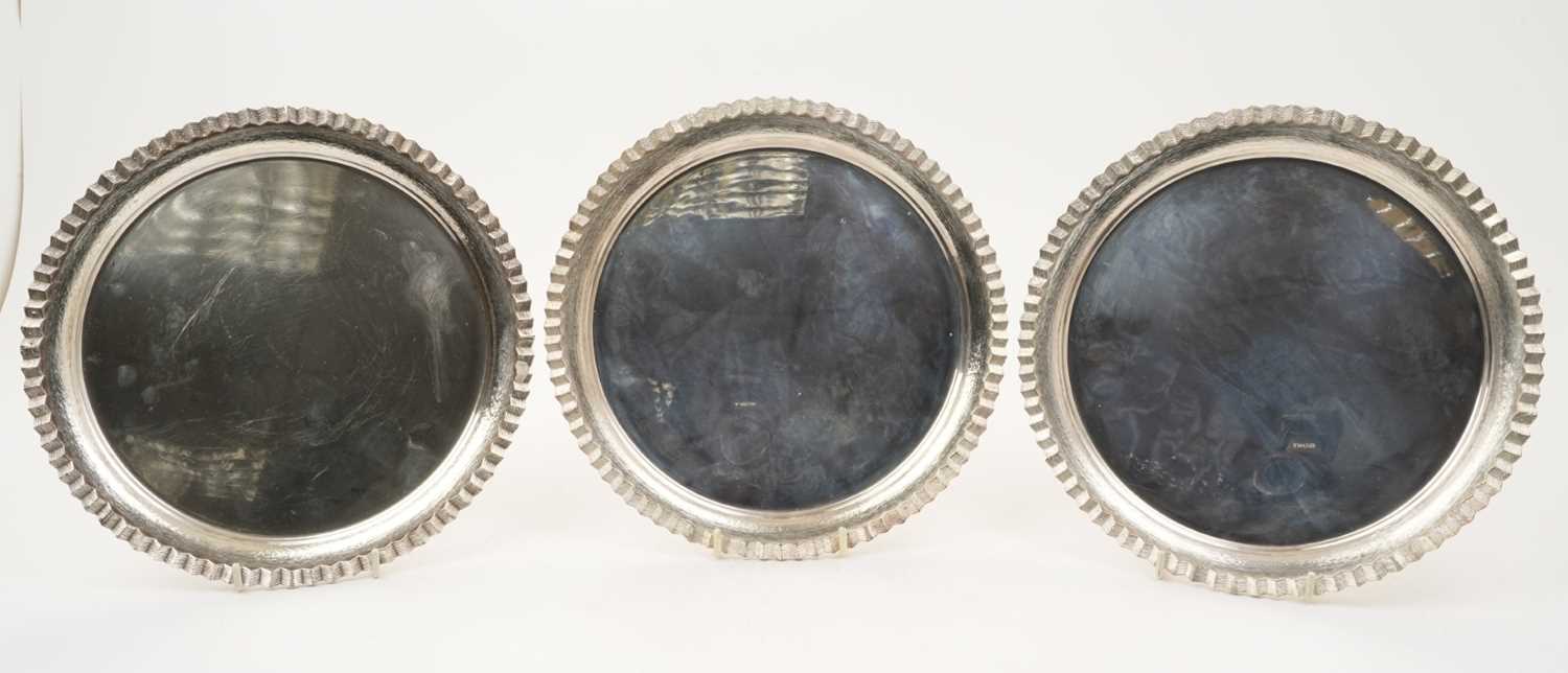 Lot 394 - Set of three fine quality modern circular