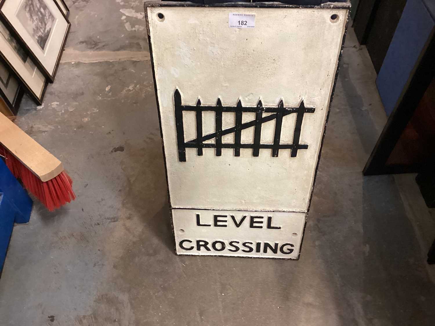 Lot 182 - Cast iron level crossing sign, together with