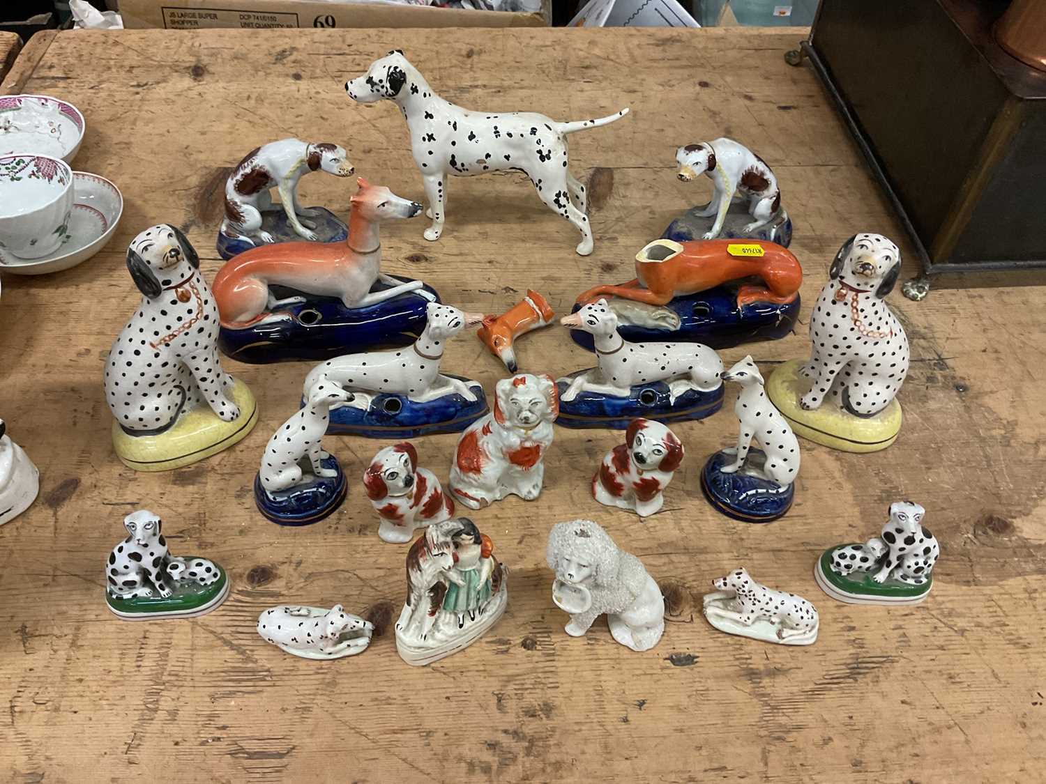 Lot 23 - Group of ceramic dogs, including some