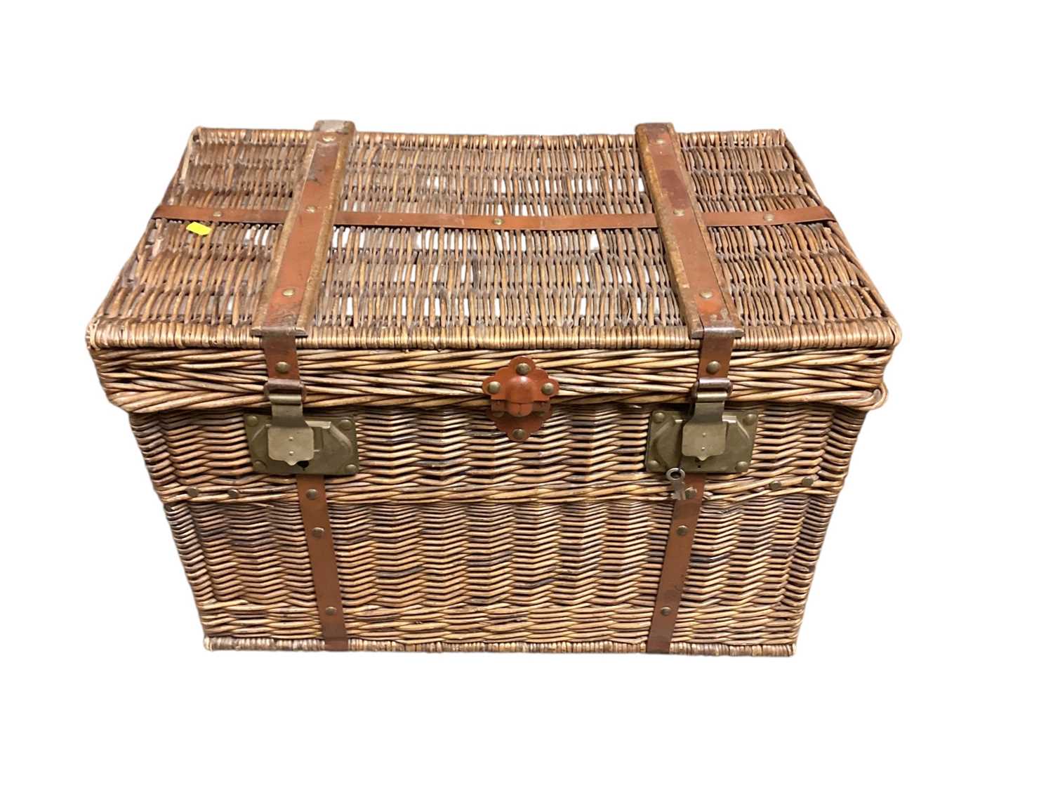 Lot 1331 - Large wicker trunk with metal strapwork,