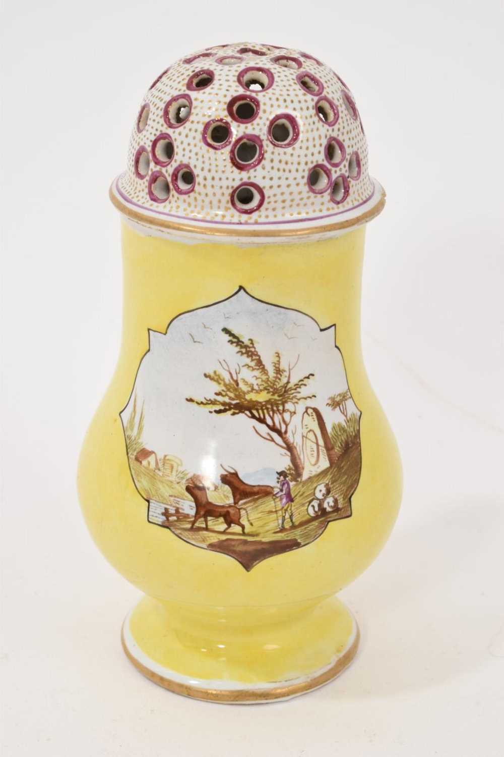 Lot 208 - French faience yellow ground sugar caster