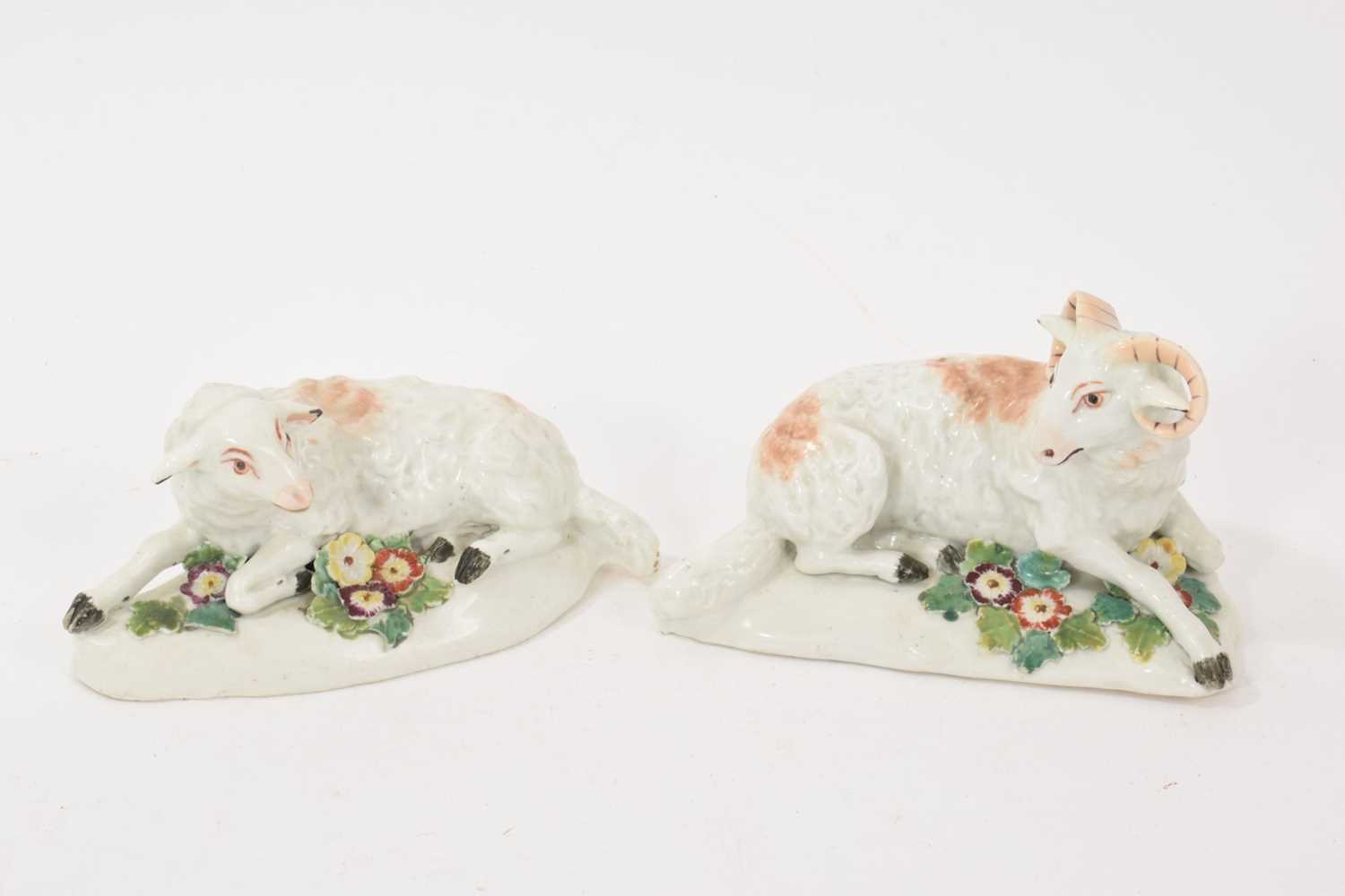 Lot 246 - Pair of Derby models of recumbent sheep,