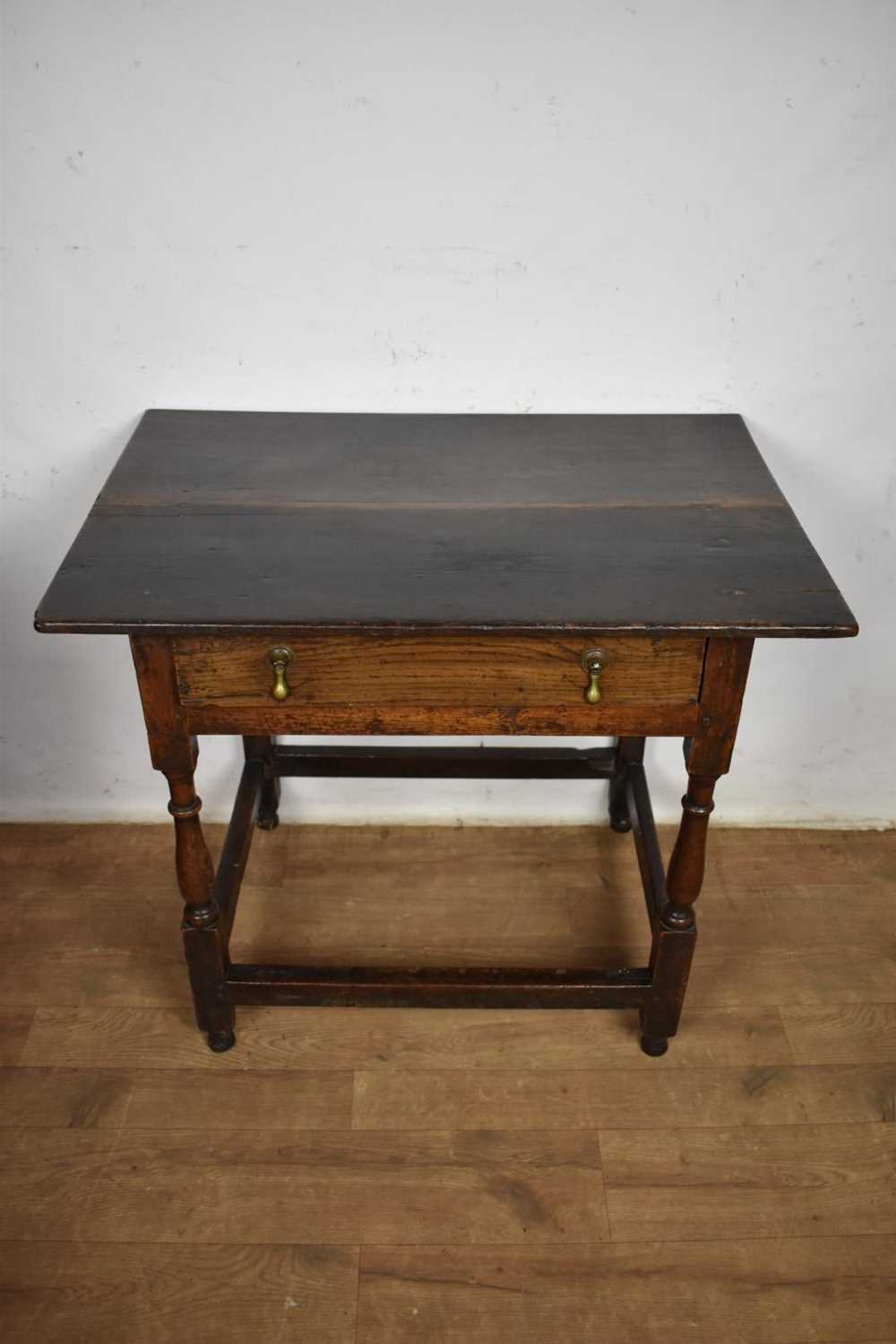 Lot 1651 - Late 17th century oak single drawer side