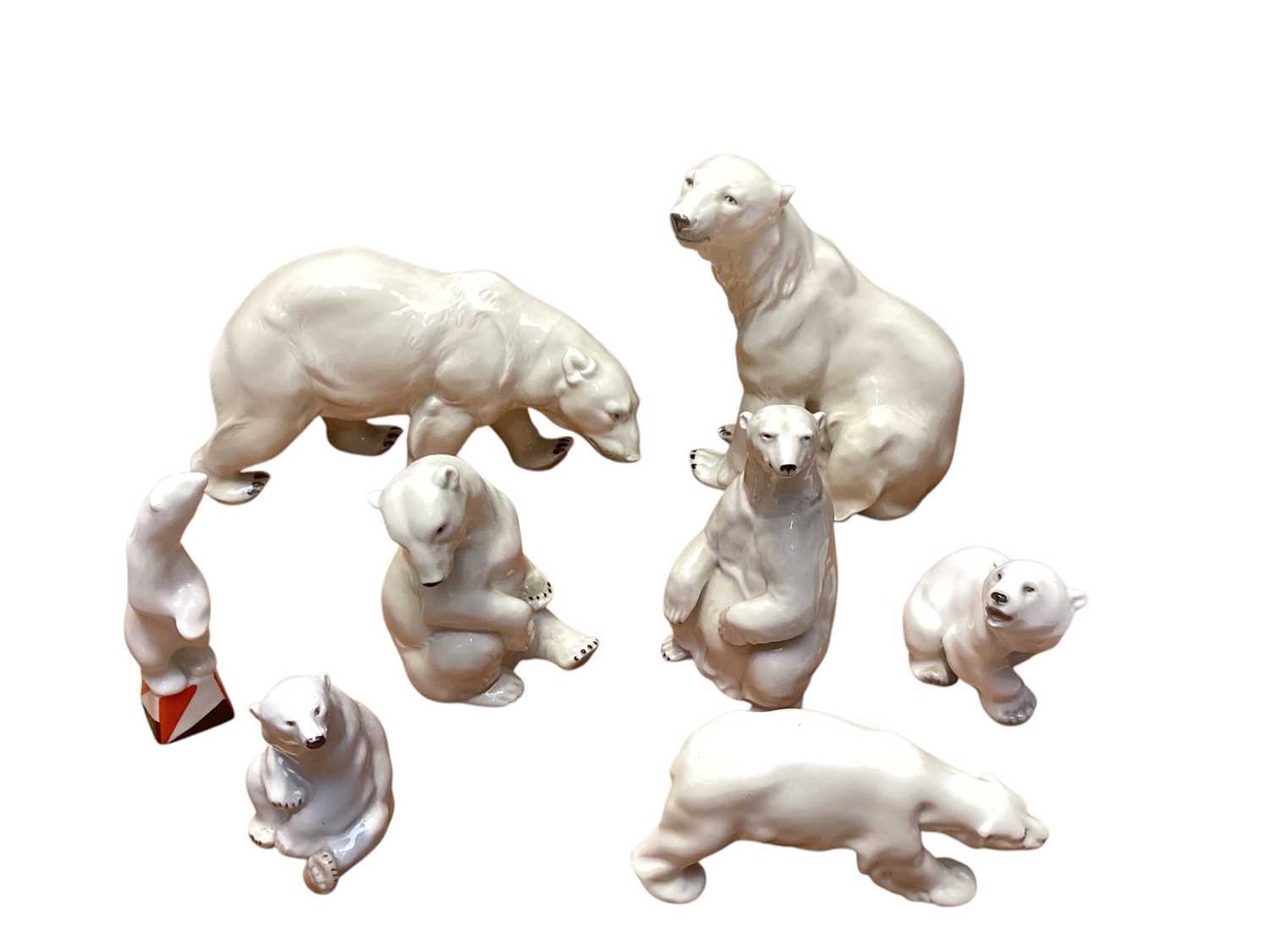 Lot 1188 - Group of eight models of polar bears,