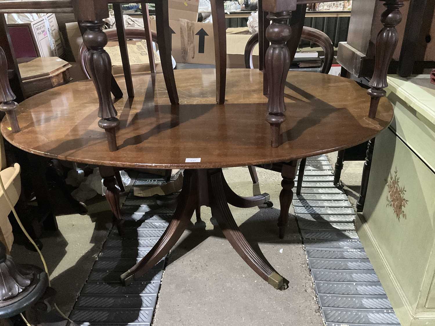Lot 137 - Regency mahogany oval breakfast table, with