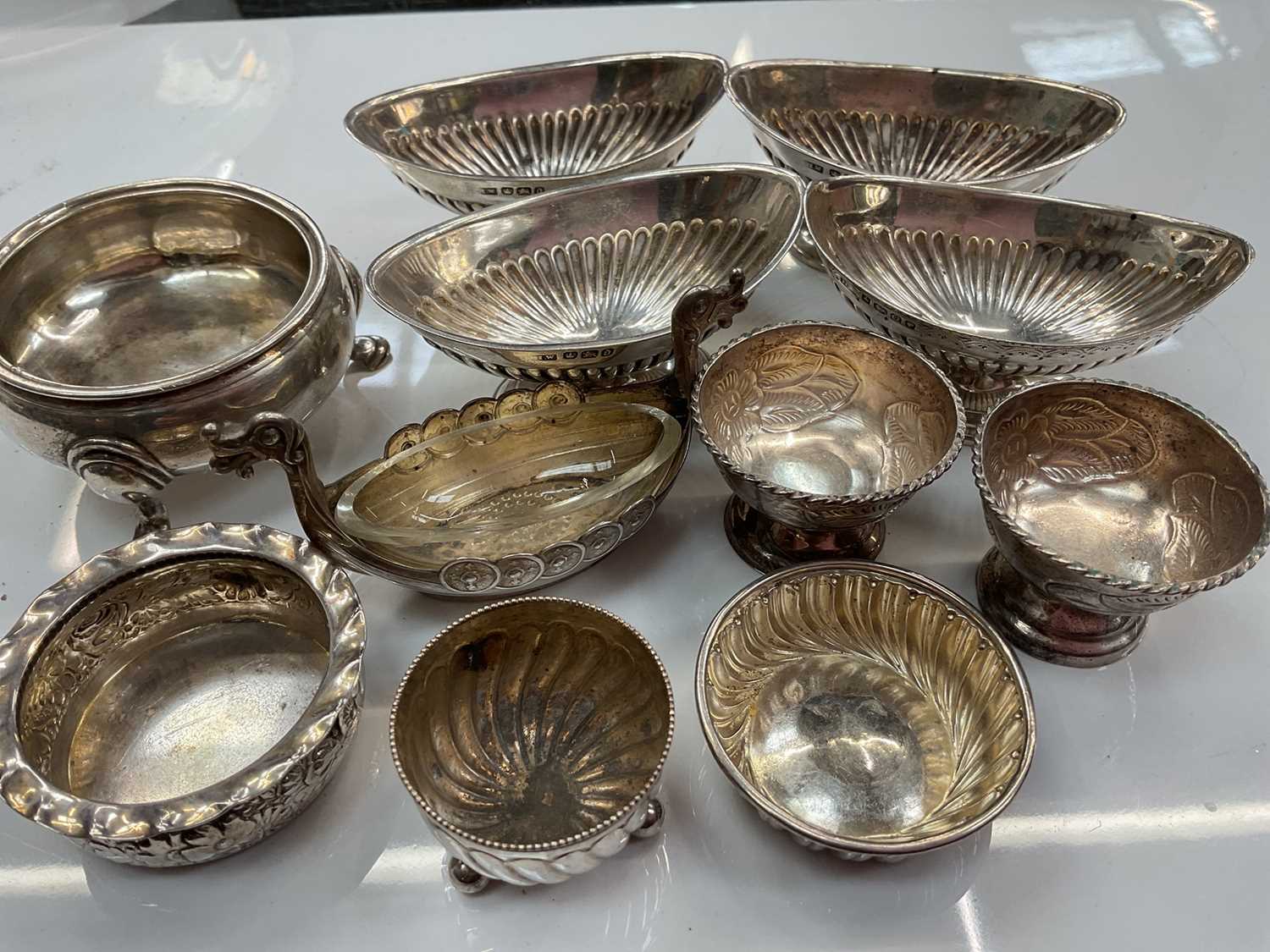 Lot 1058 - Georgian silver cauldron salt, together