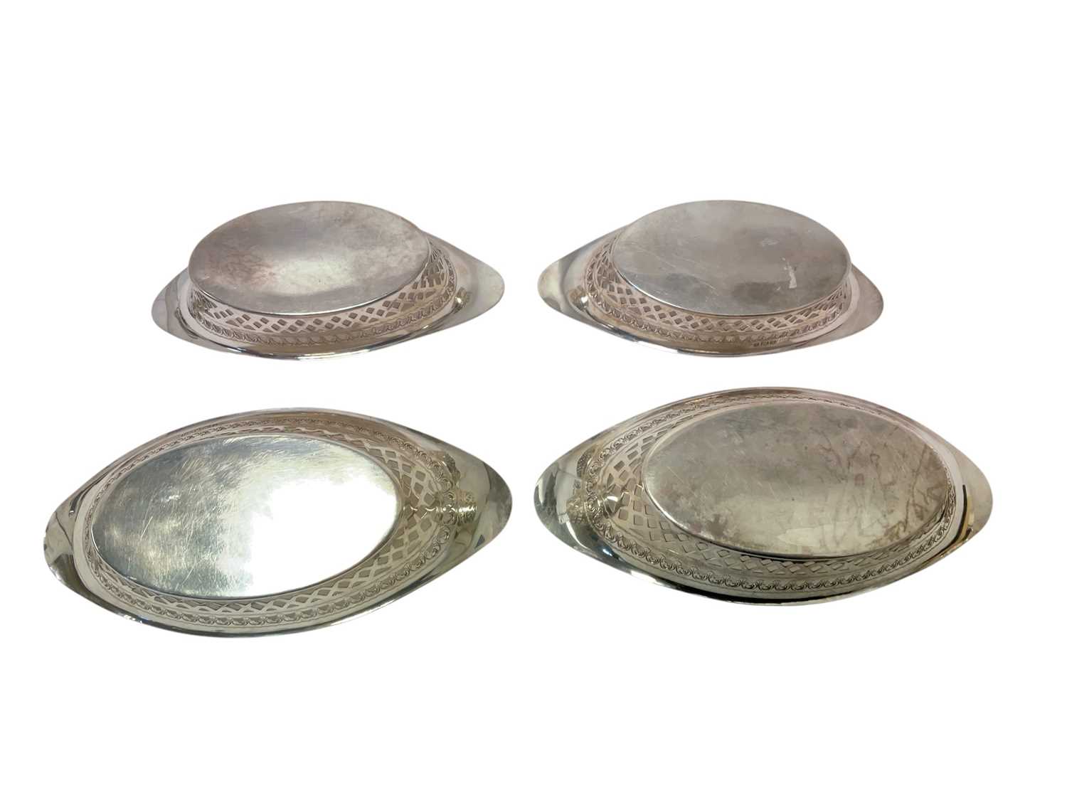 Lot 415 - Set of four silver navette form bon-bon