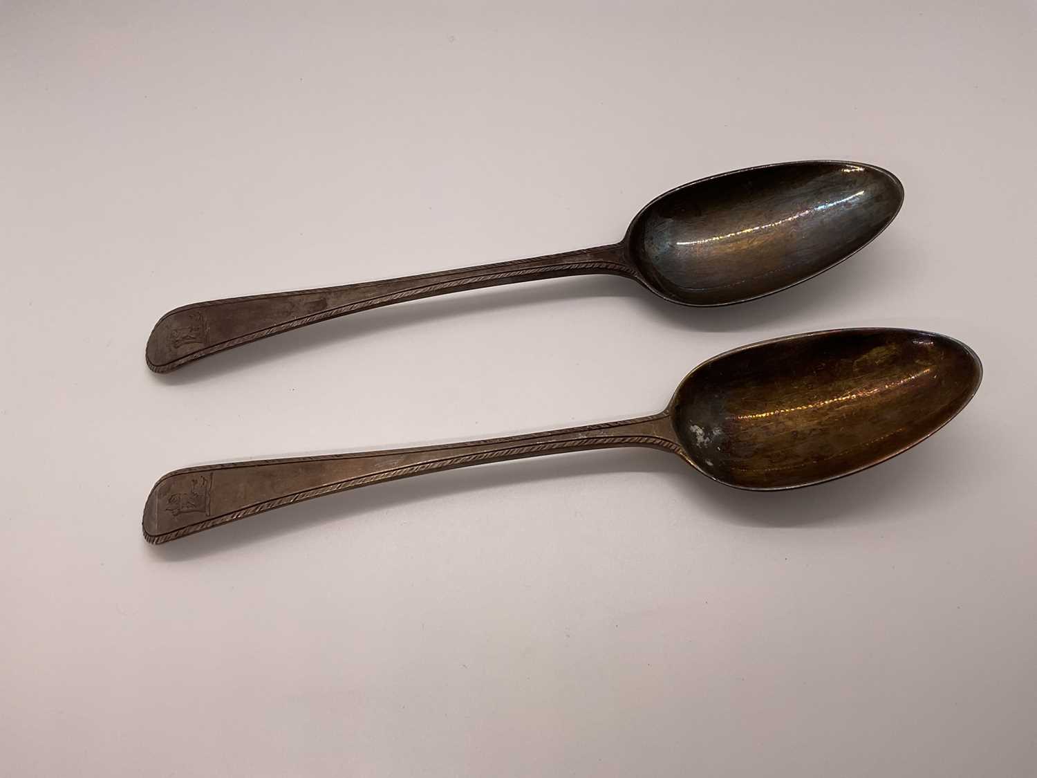 Lot 36 - Pair of George III silver feather edge Old