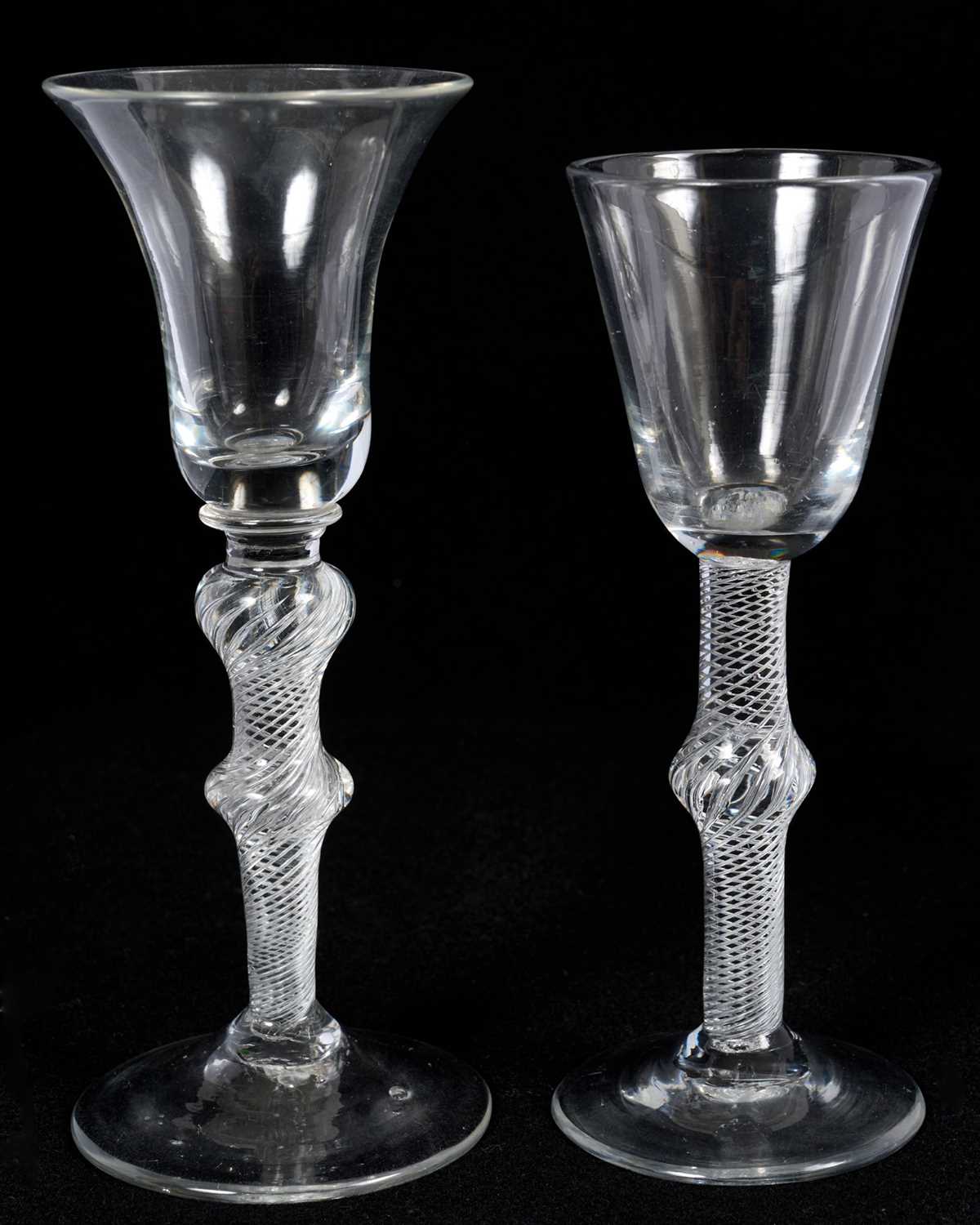 Lot 58 - Two 18th century multi spiral air twist wine