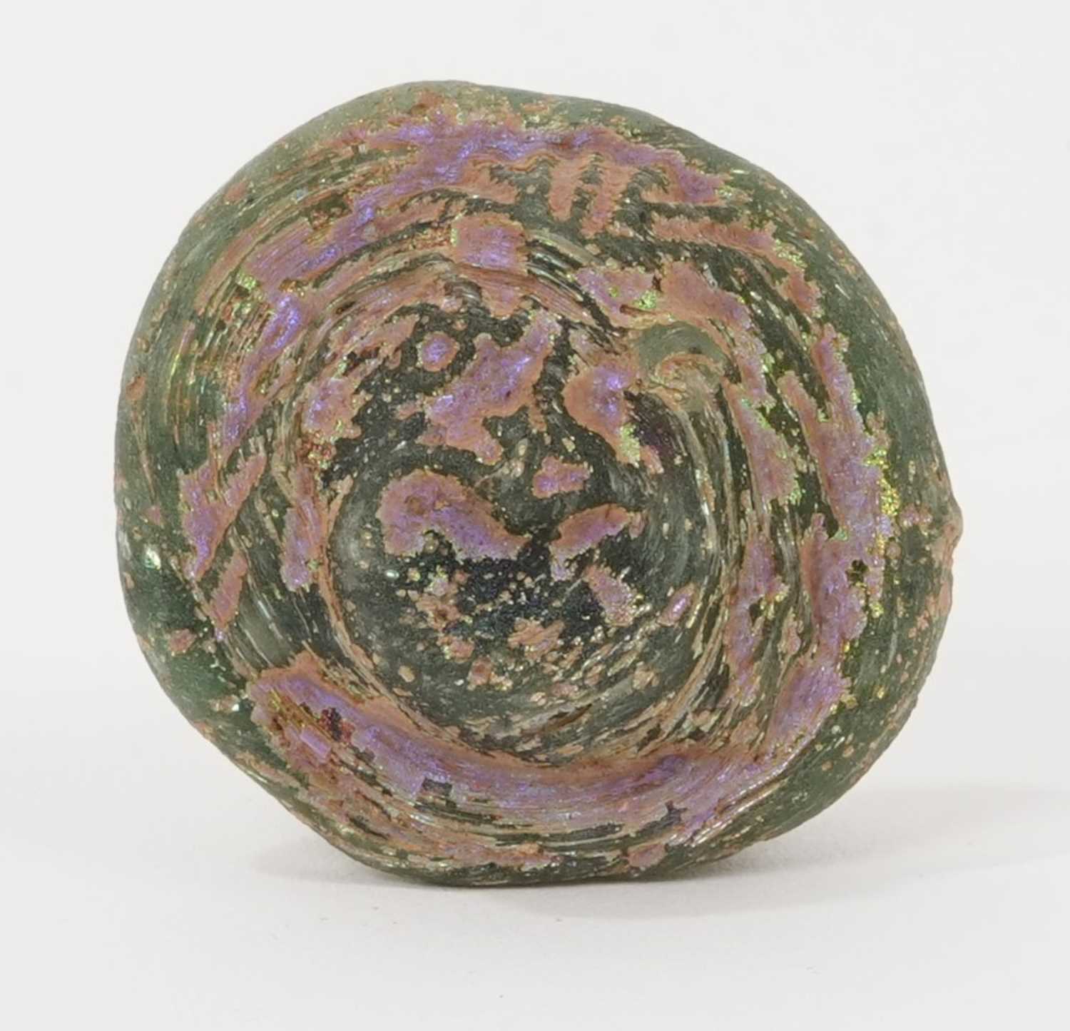 Lot 210 - Roman iridescent green glass roundel