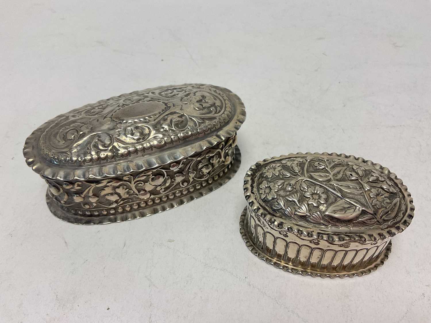 Lot 1046 - Two Victorian silver oval trinket boxes
