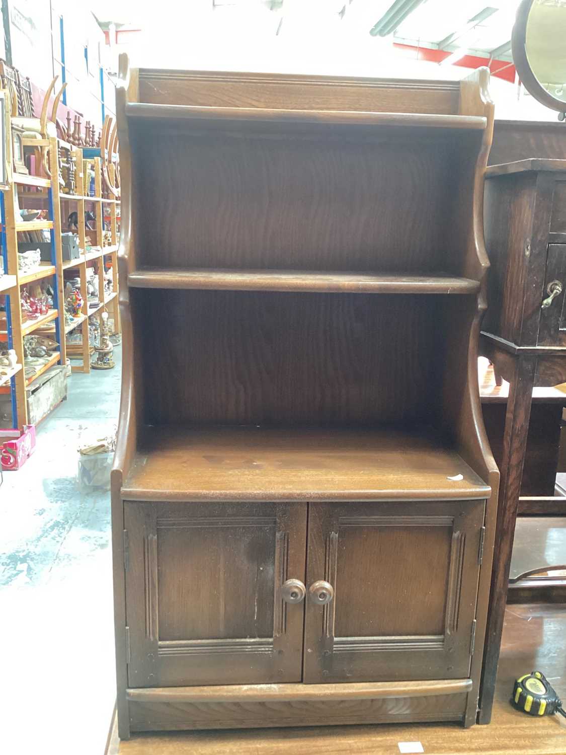 Lot 1272 - Ercol waterfall bookcase