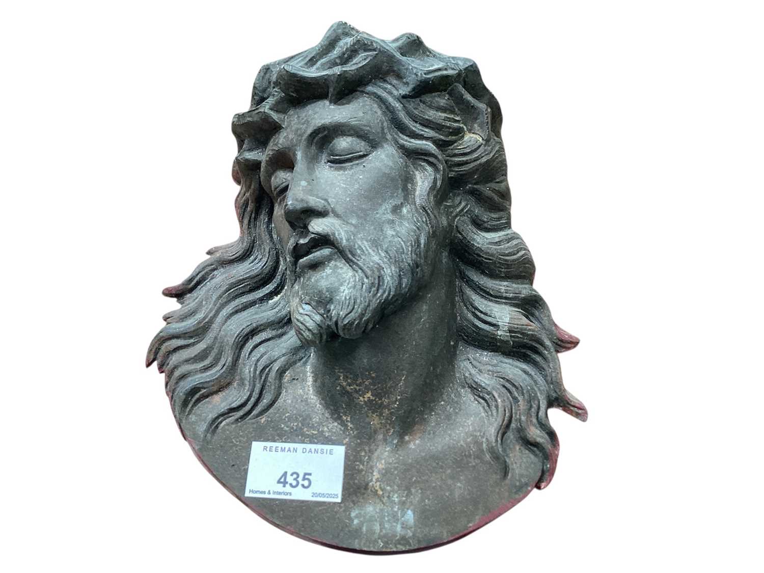 Lot 435 - Cast metal relief bust of Jesus Christ,