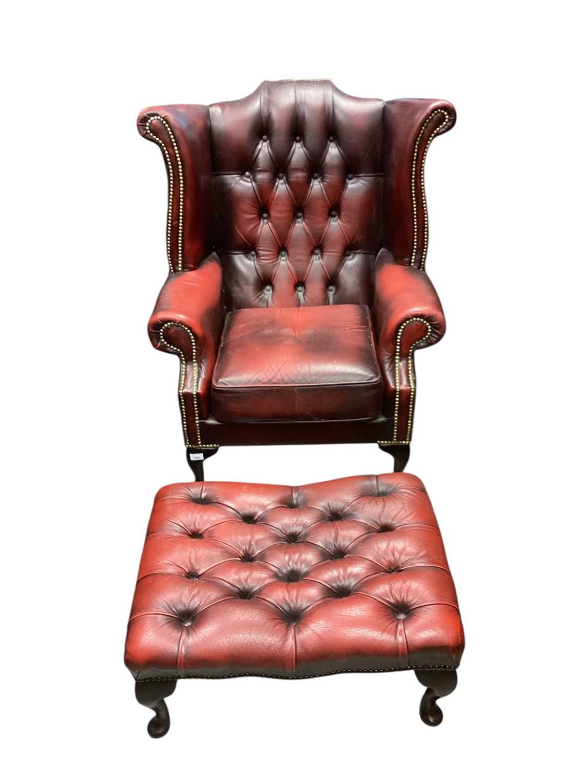 Lot 1391 - Georgian style oxblood leather wing back