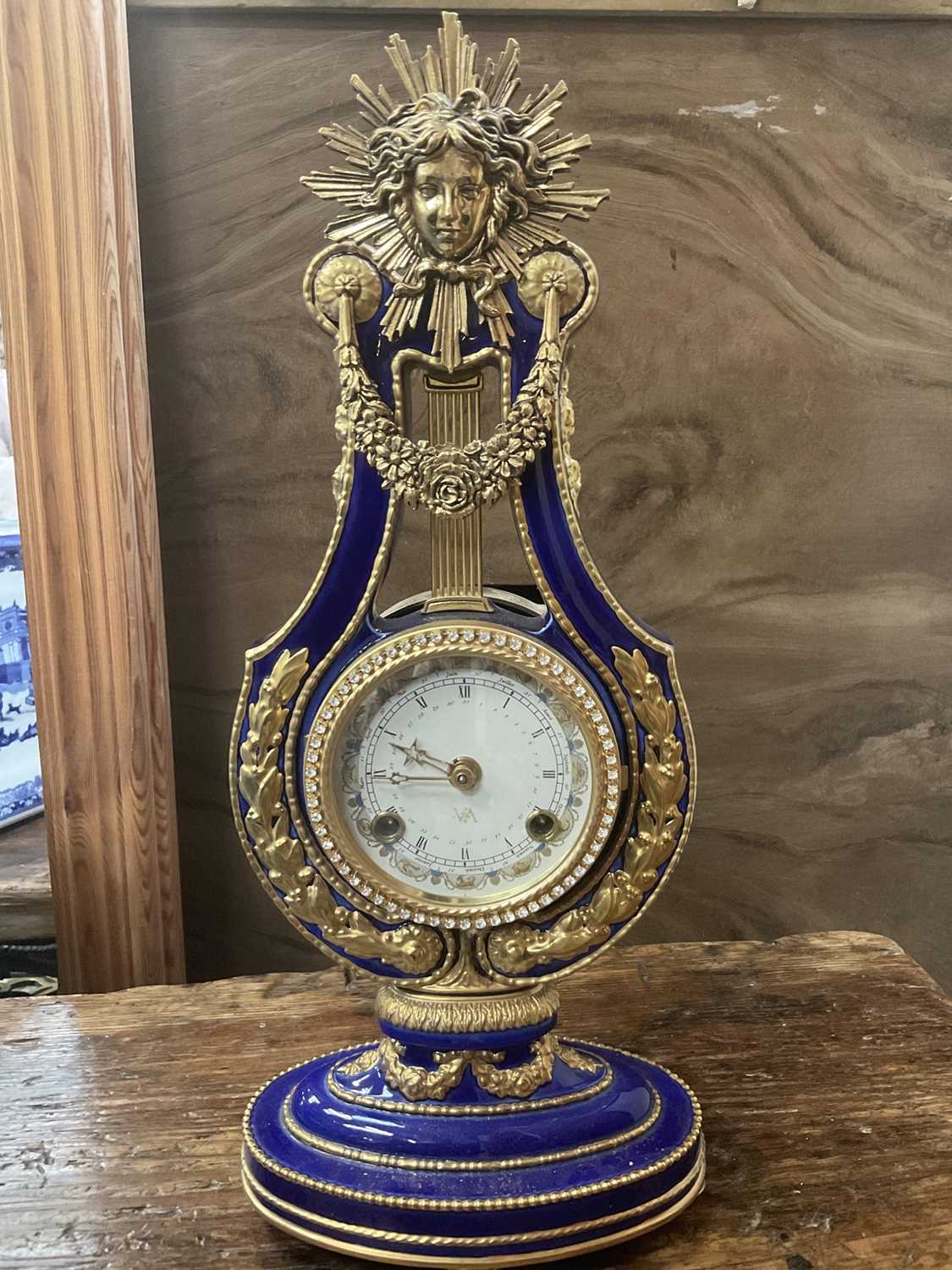 Lot 822 - Reproduction clock in porcelain case