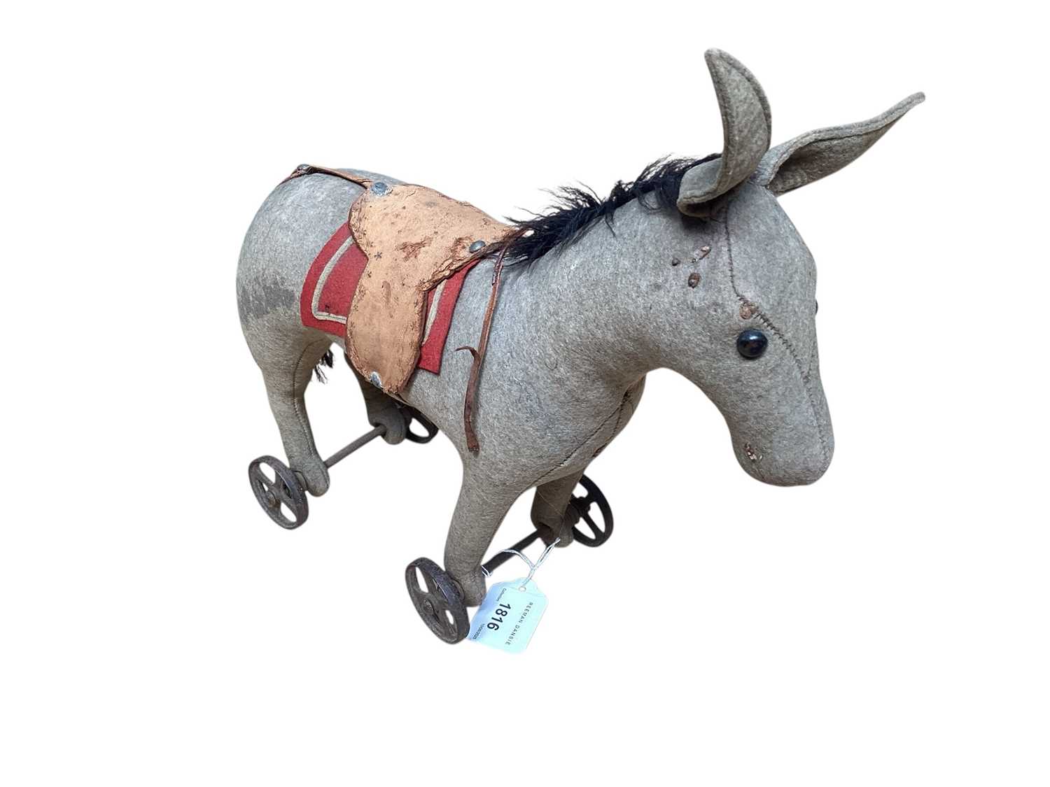 Lot 1816 - Early felt pull-a-long horse thought to be