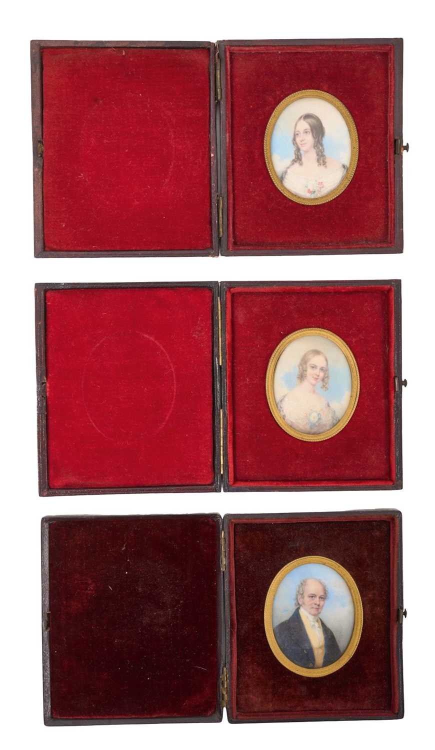 Lot 1009 - Set of three portrait miniatures on ivory